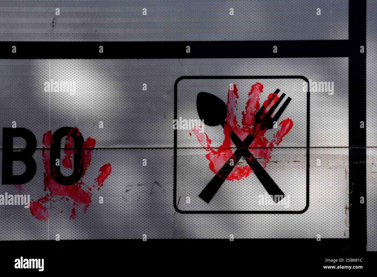 Red hands, a symbol representing the government's bloody hands, are ...