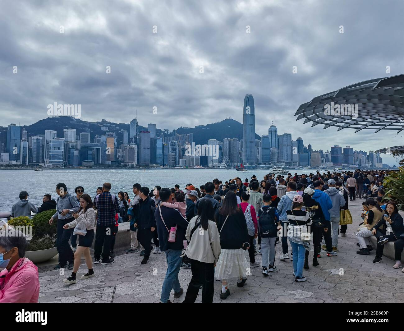 Hong Kong, China - February 01, 2025 : Crowds of tourists enjoy the ...
