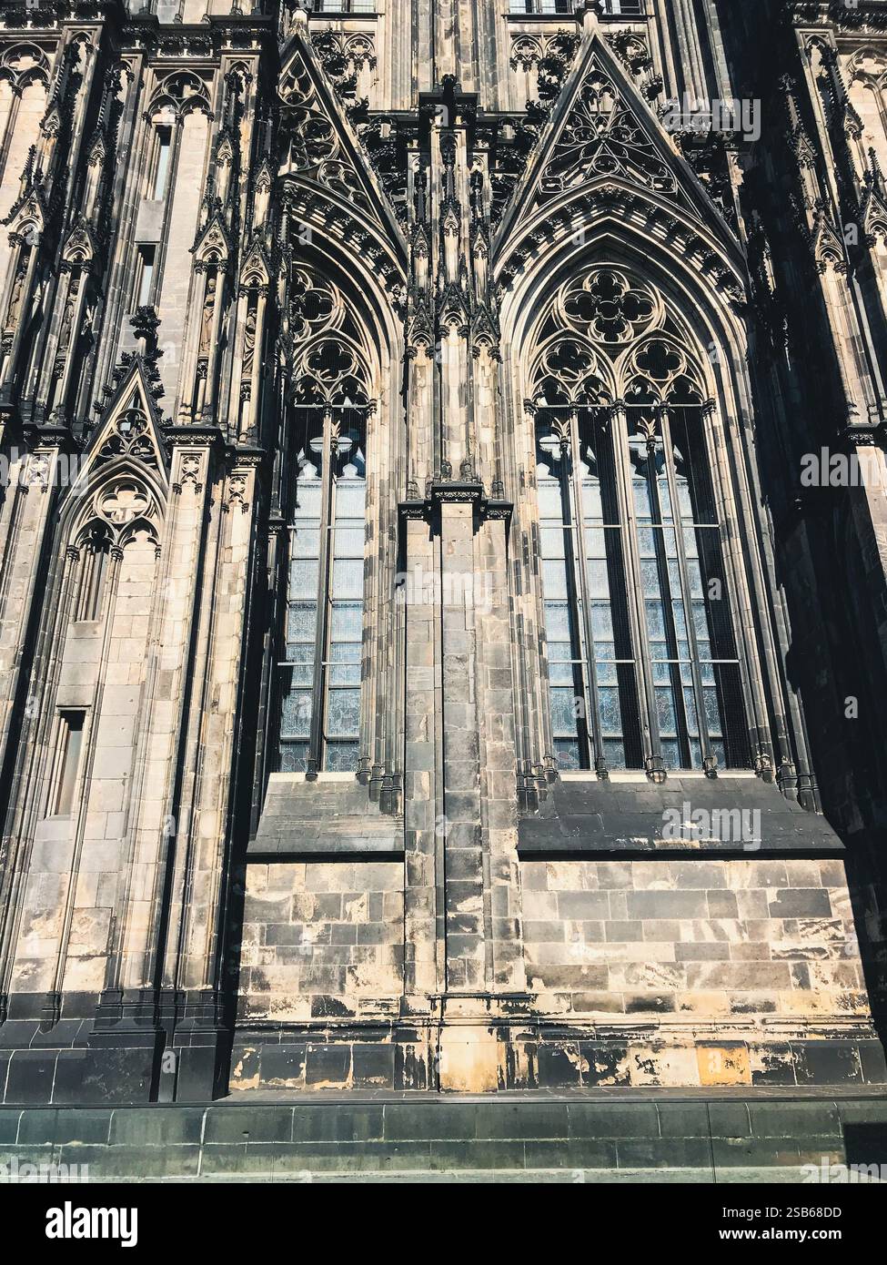 Cathedral in Cologne. The building has a lot of windows and a lot of ...