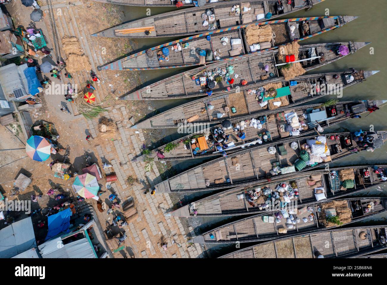 Aerial view of the bustling riverside bazar, Nakalia, with a fleet of ...