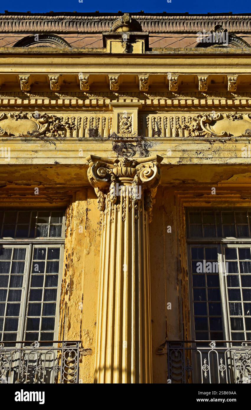 Ionic column on old yellow facade with ornaments, Petropolis, Rio de ...