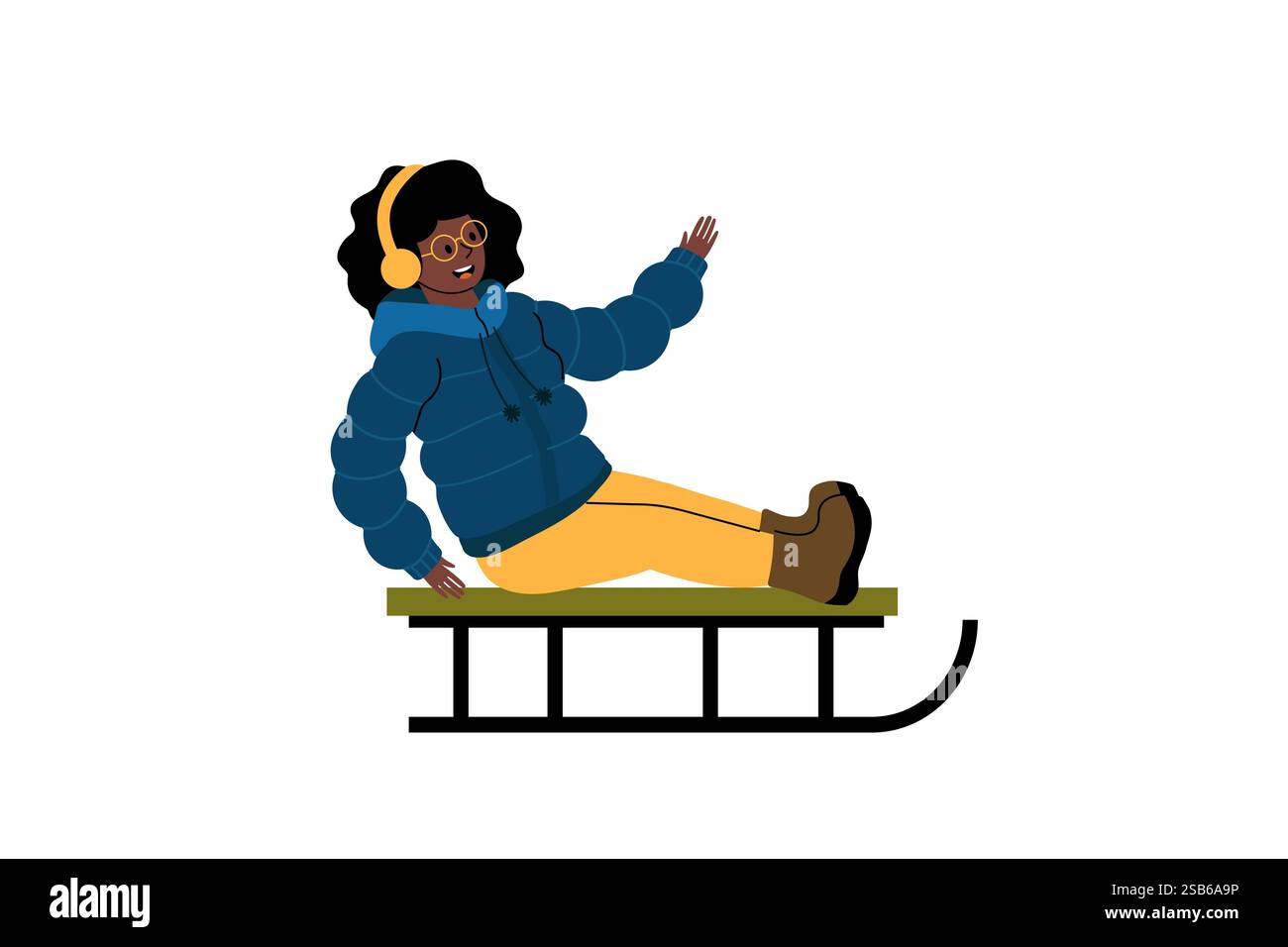 A joyful child is sledding down a hill during winter. Wearing a warm ...