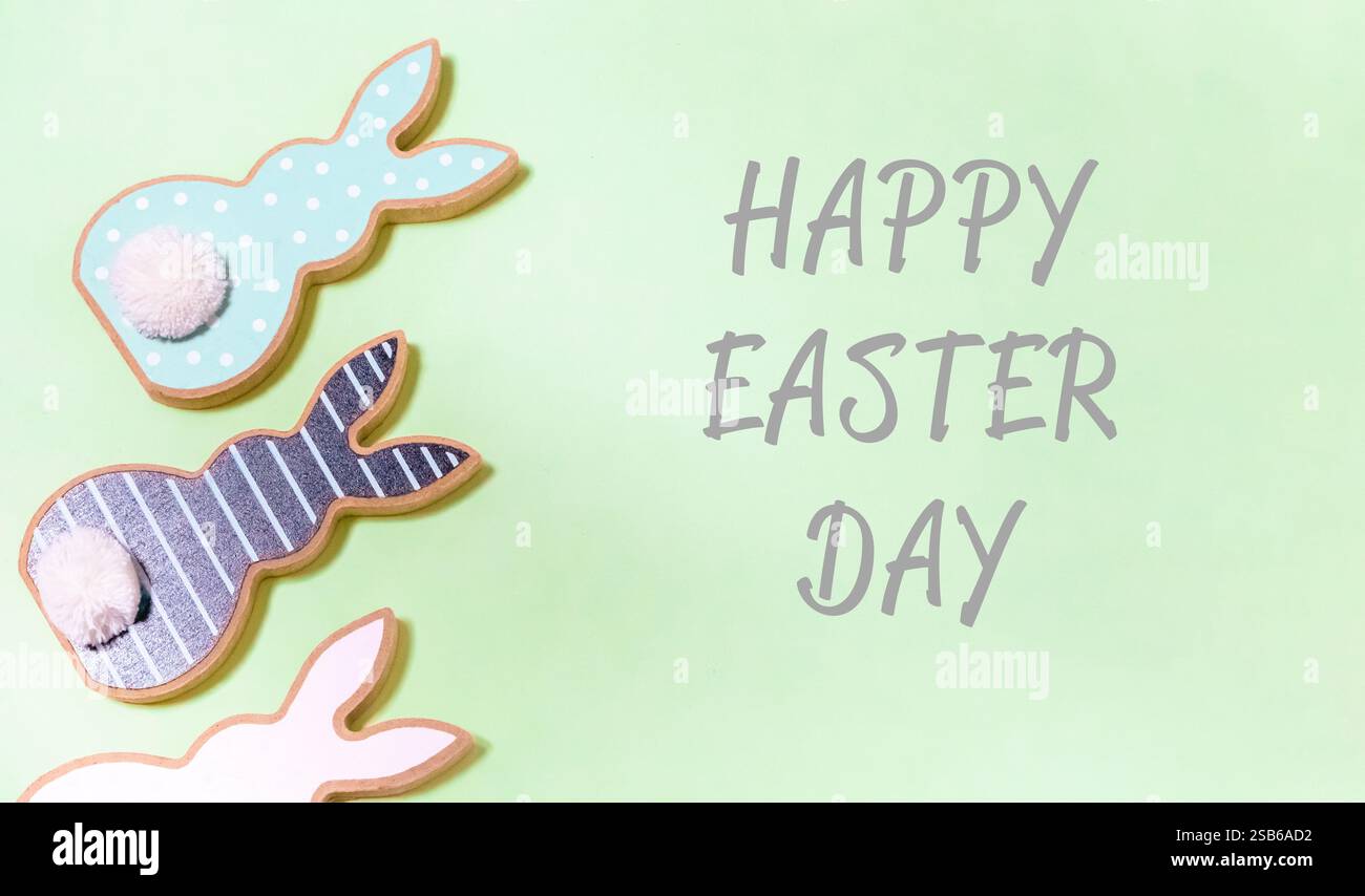 Three Easter bunnies are on a green background. The bunnies are ...