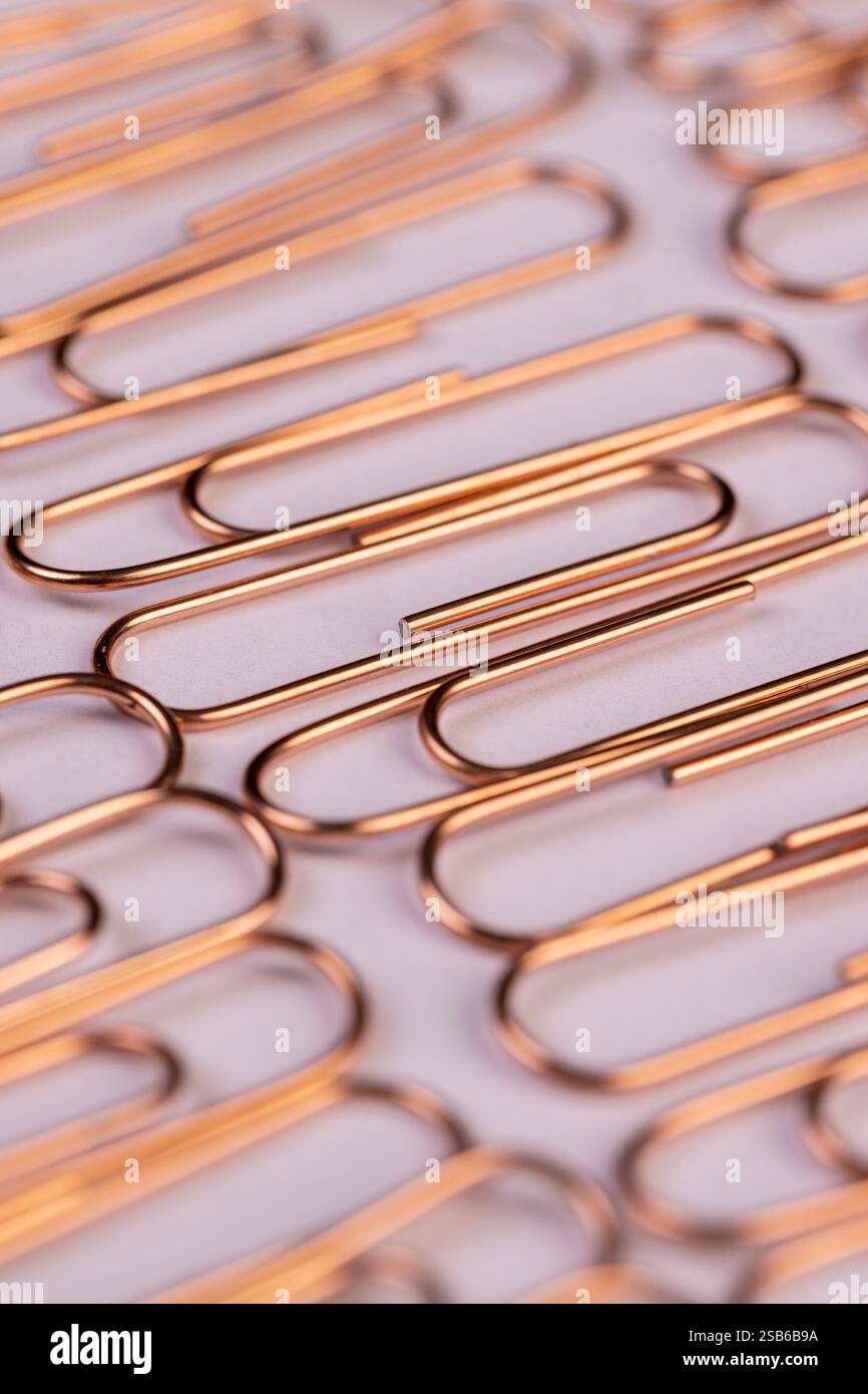 orange paper clips made of metal for documents and paper, large sized ...