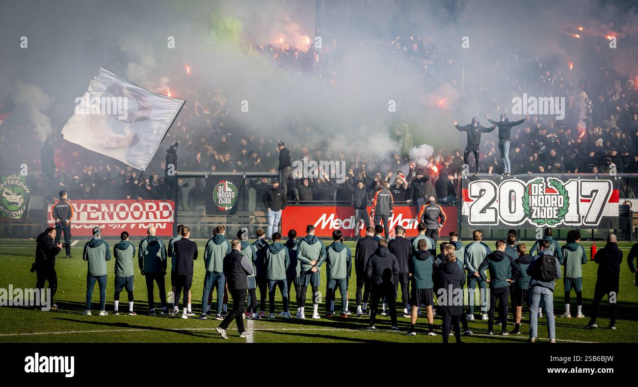 ROTTERDAM - Feyenoord players and feyenoord fans during training prior ...