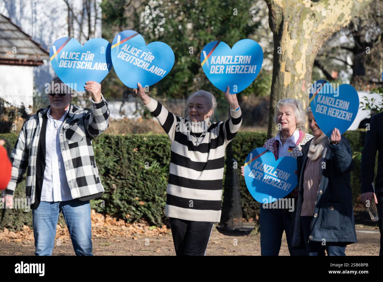 Neu Isenburg, Germany. 01st Feb, 2025. Pro-AfD demonstrators stand in ...