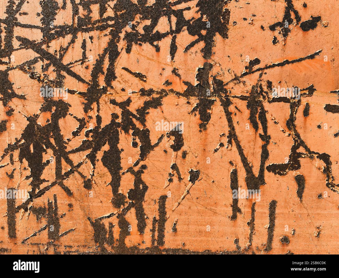 The image is of a wall with a lot of scratches and marks on it. The ...