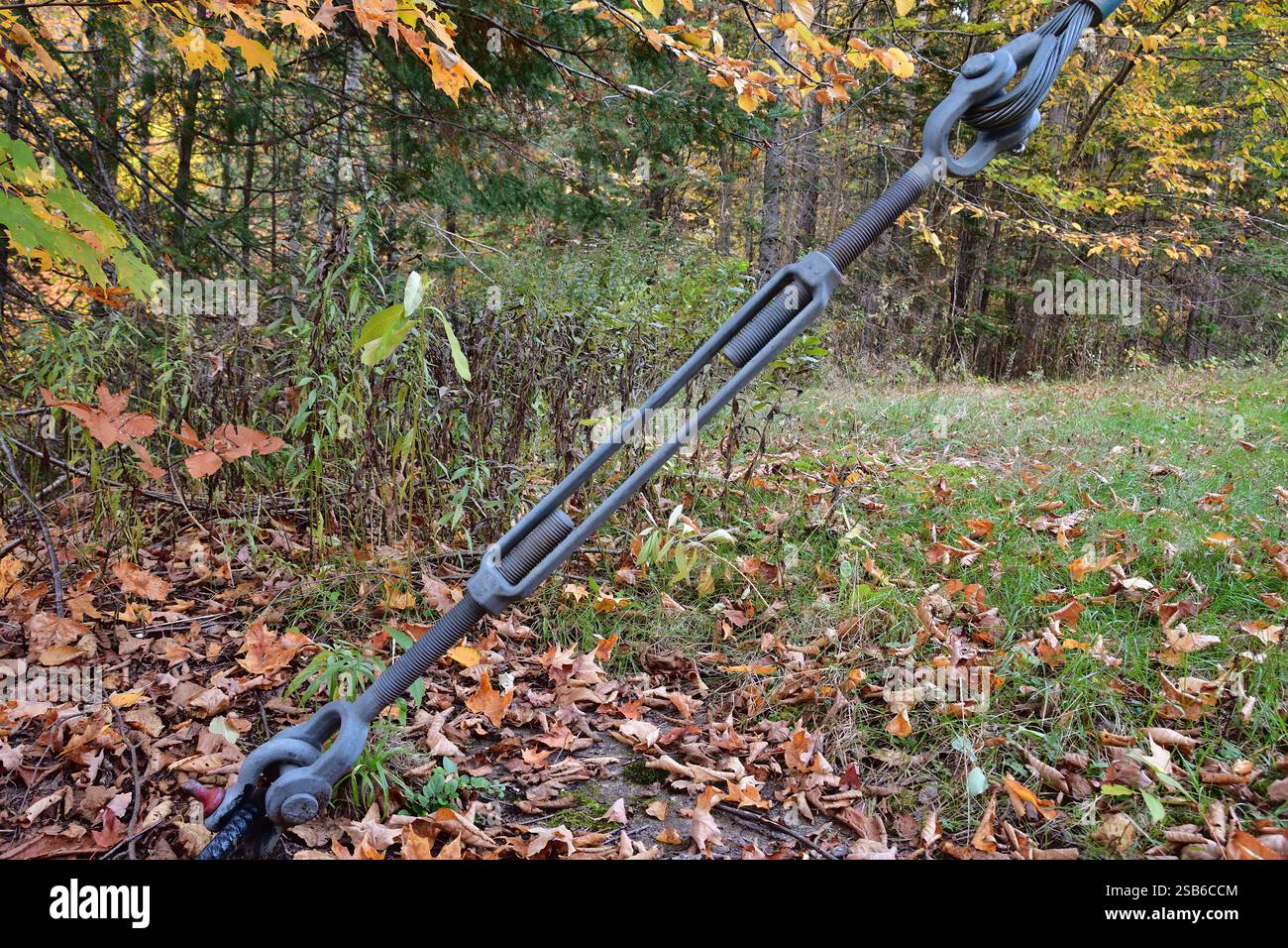 Galvanized steel turnbuckle with jaw ends under tension. Adjustable ...