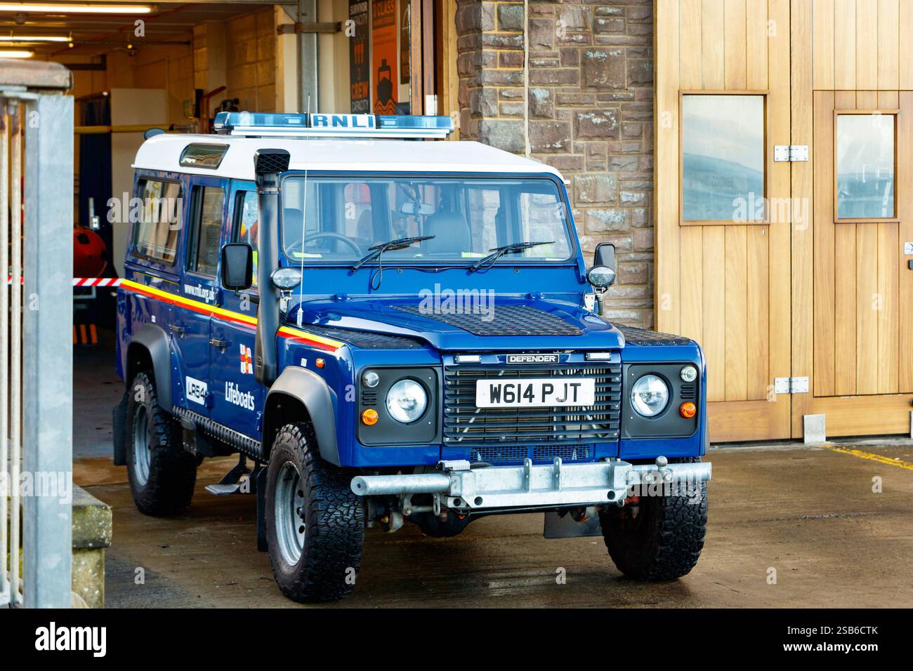 Blue Land Rover used by a lifeboat crew parked outside a lifeboat ...