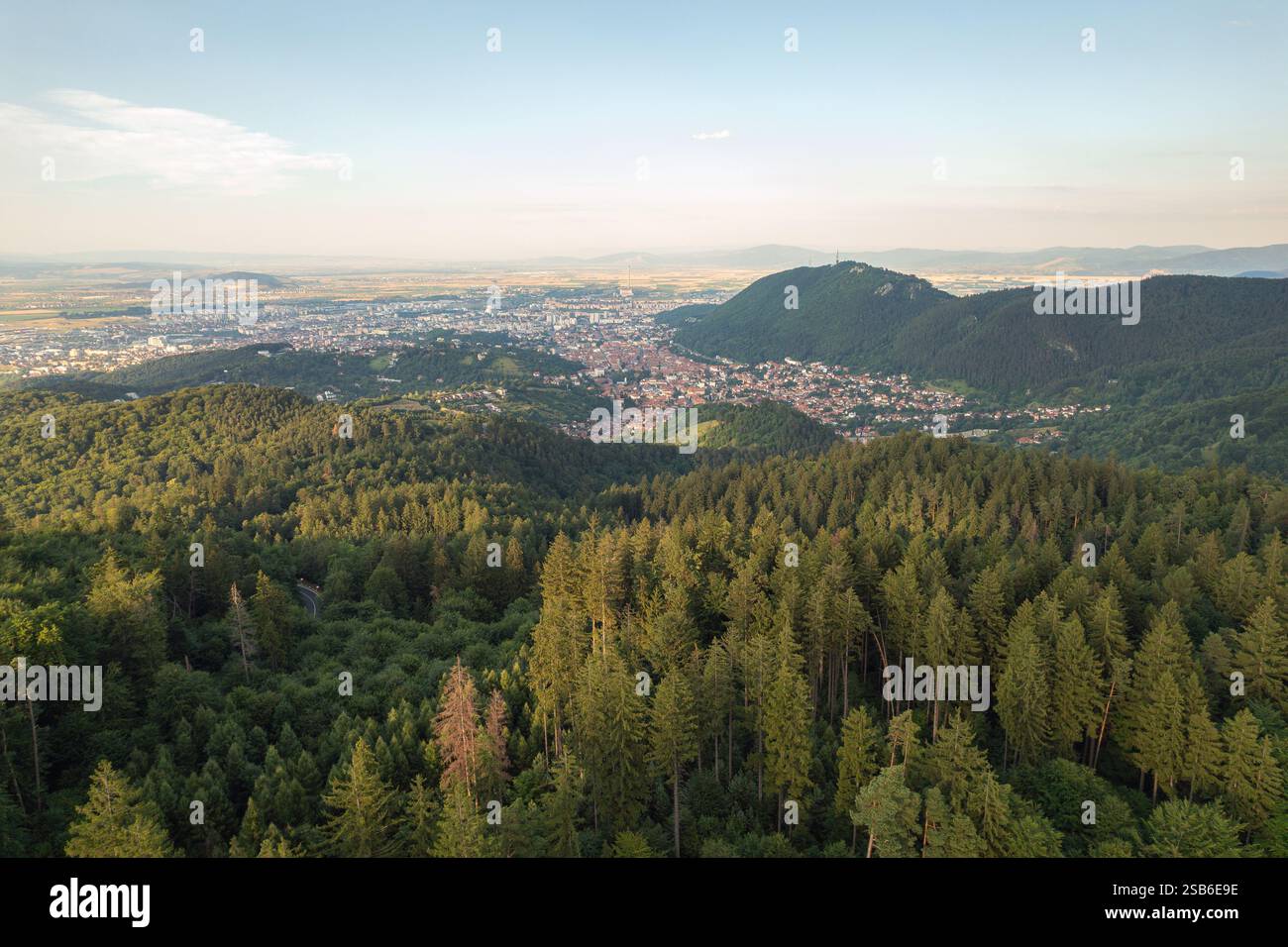 Summer aerial landscape with green hills above the Romanian village ...