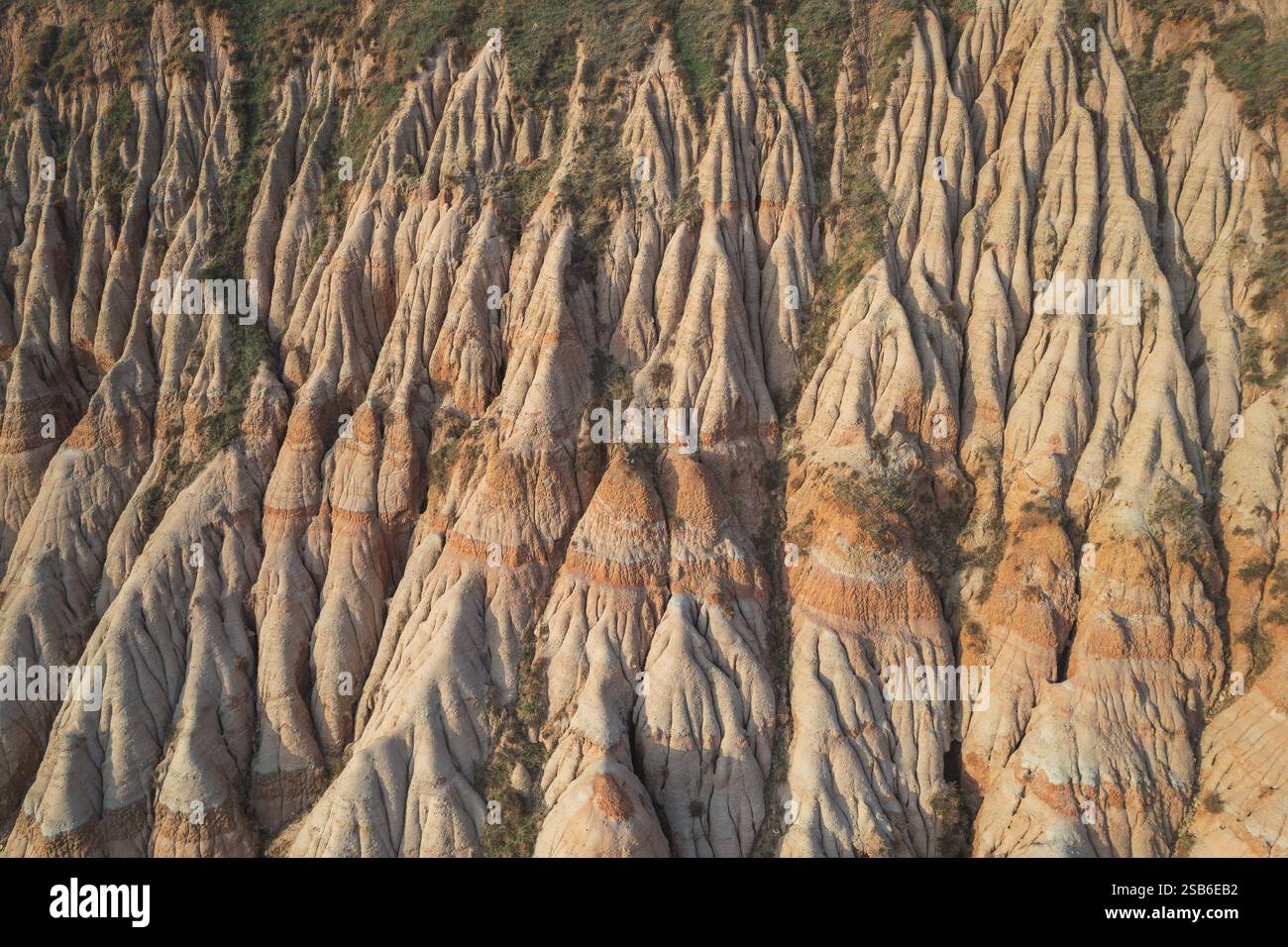 Aerial view above the Red Ravine / Rapa Rosie geological reserve with ...