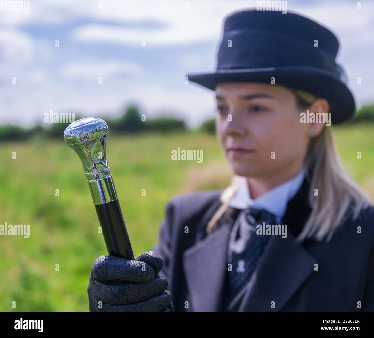 A traditional cane carried by a funeral director during a funeral ...