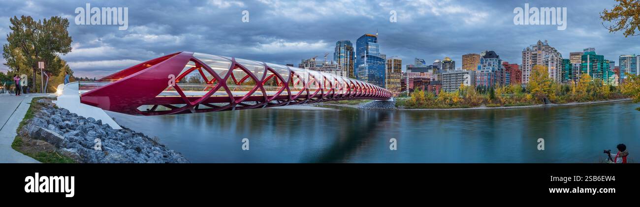 A panoramic view of the Peace Bridge in Calgary, Canada, at dusk. The ...