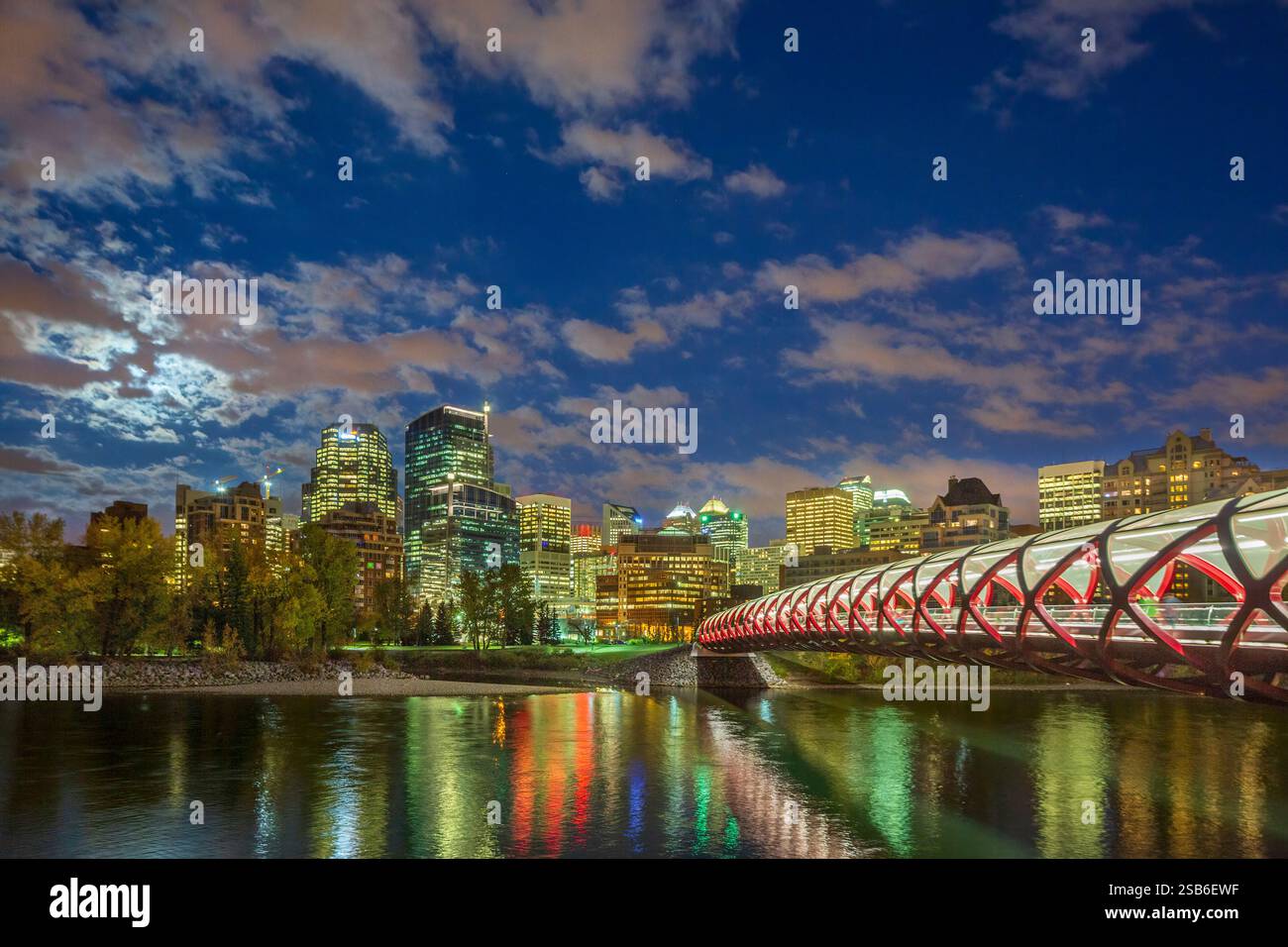 A panoramic view of the Peace Bridge in Calgary, Canada, at dusk. The ...