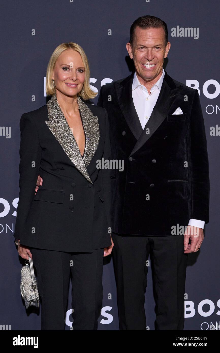 Louise Camuto Grieder, left, and Daniel Grieder pose for photographers ...