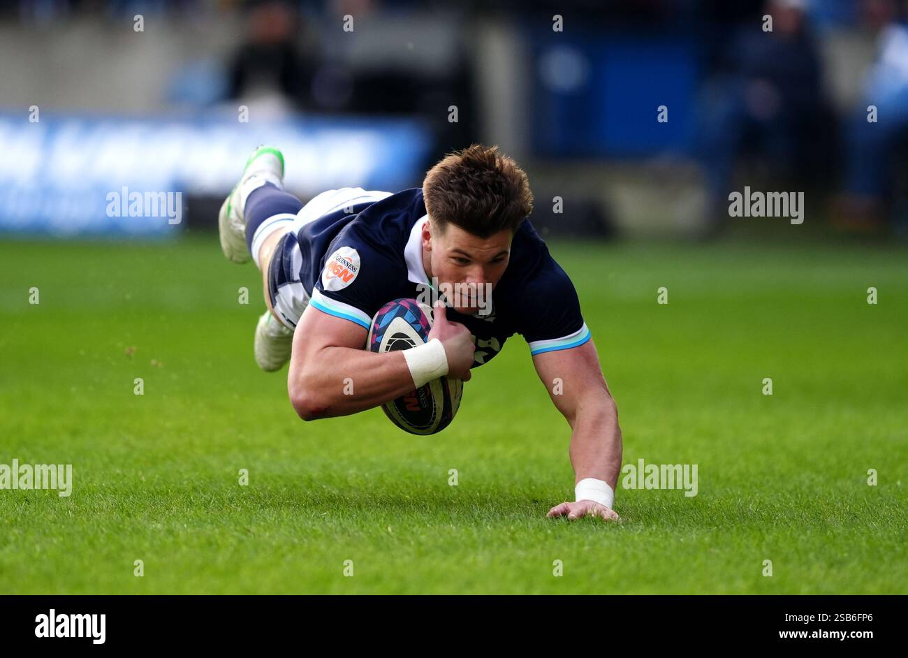 Scotland's Huw Jones scores a try during the Guinness Six Nations match ...