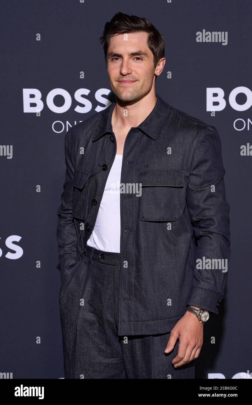 Phil Dunster poses for photographers upon arrival at the BOSS One x ...