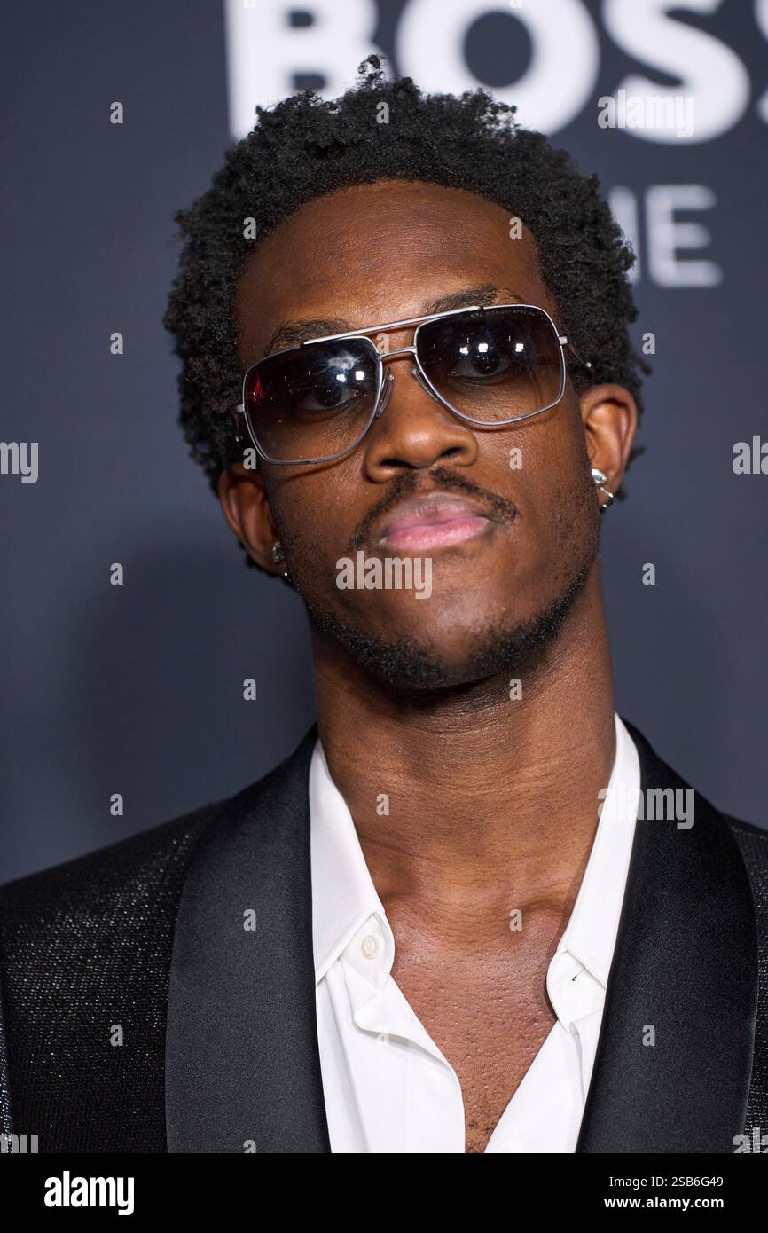 Wisdom Kaye poses for photographers upon arrival at the BOSS One x ...