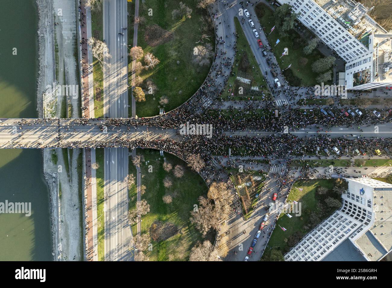 People block the Varadin bridge during a protest over the collapse of a ...