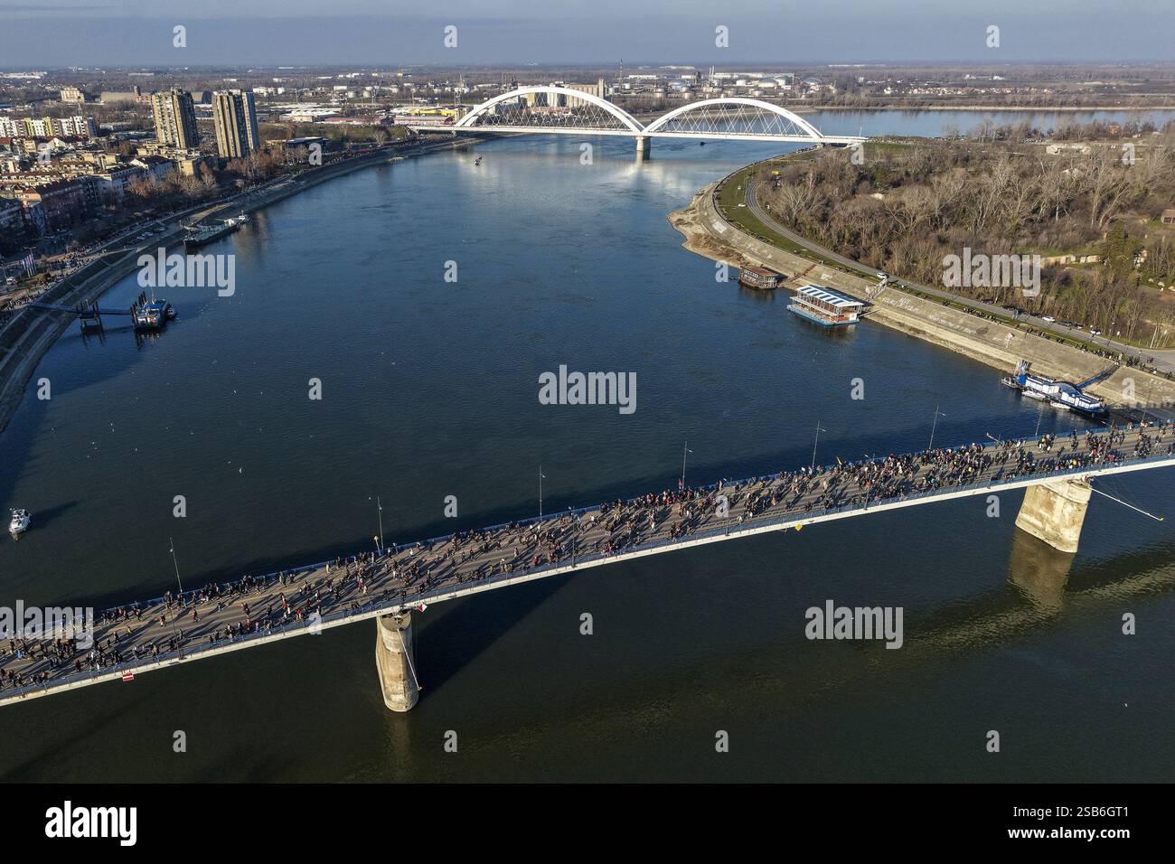 People block the Varadin bridge during a protest over the collapse of a ...