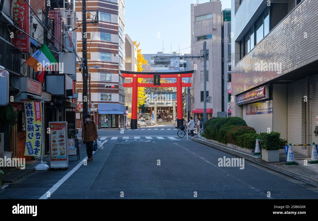 A snapshot of a typical weekday afternoon in the Tokyo urban neighborhood of Higshi-Ueno in ...