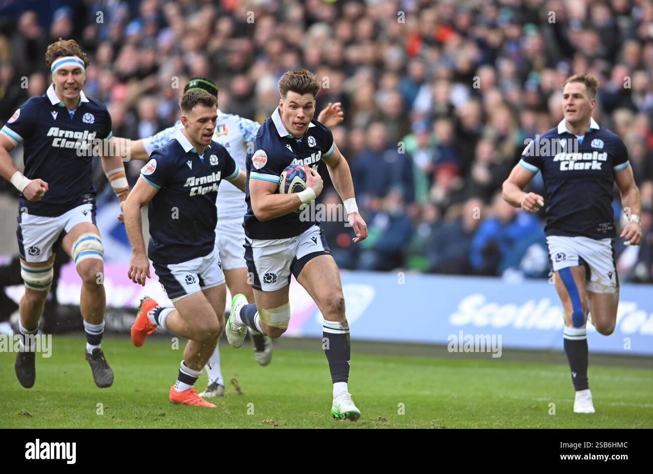 Edinburgh, UK. 1st Feb, 2025. Huw Jones of Scotland gathers to score ...