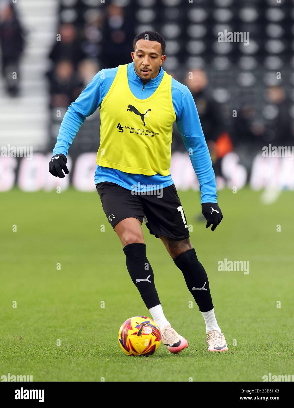 Derby County's Nathaniel Mendez-Laing warms up before the Sky Bet ...