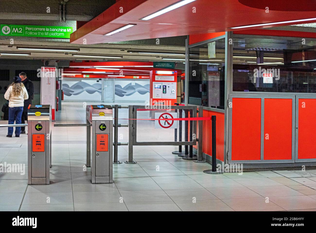 entrance through turnstiles in the Milan metro station in Italy in ...