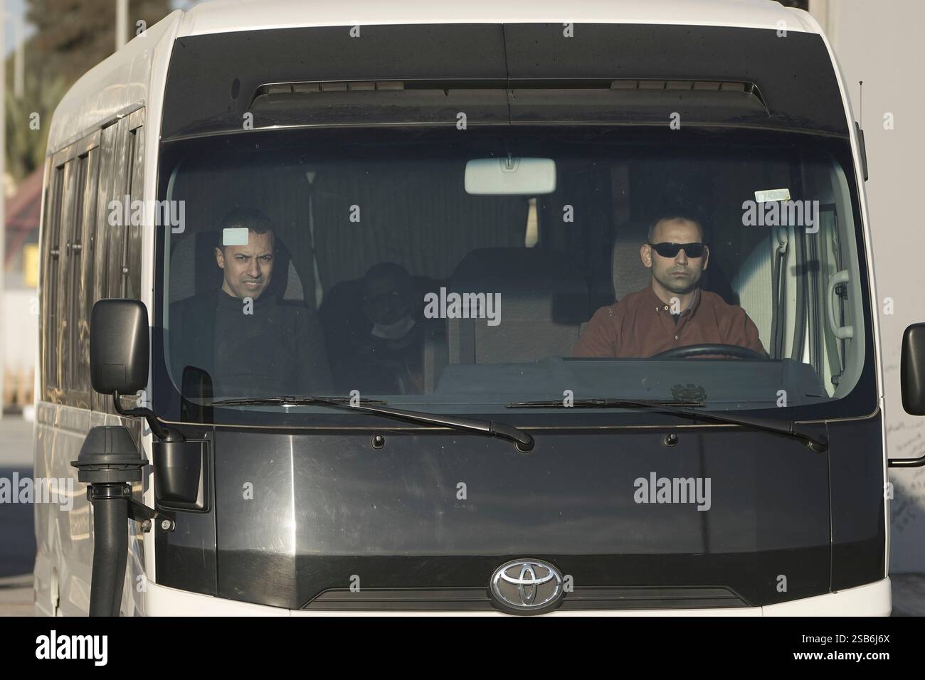 Palestinian prisoners cross at Rafah border crossing, Egypt, Saturday, Feb. 1, 2025. (AP Photo ...