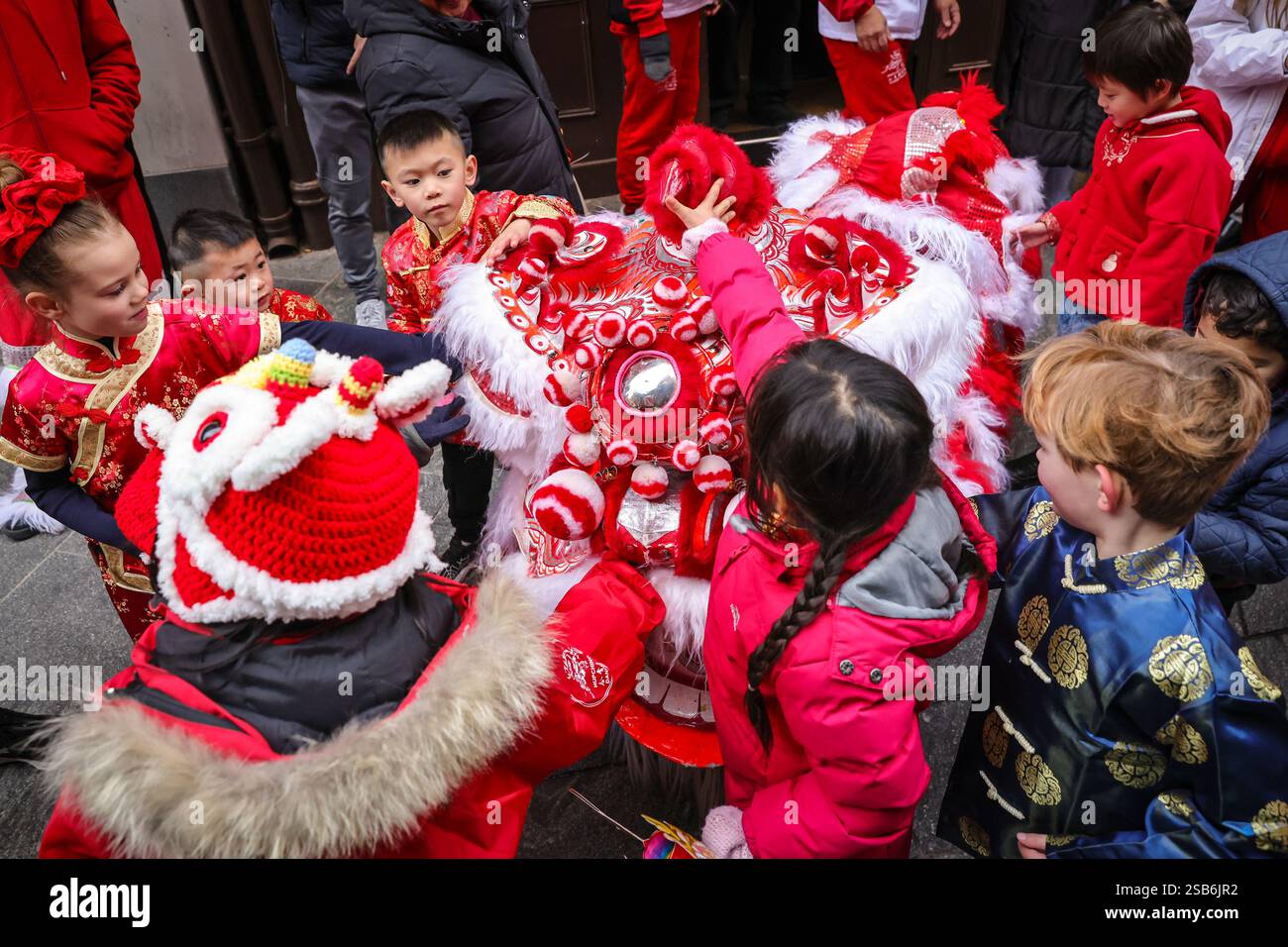 London, UK. 01st Feb, 2025. A group of children with their parents have ...