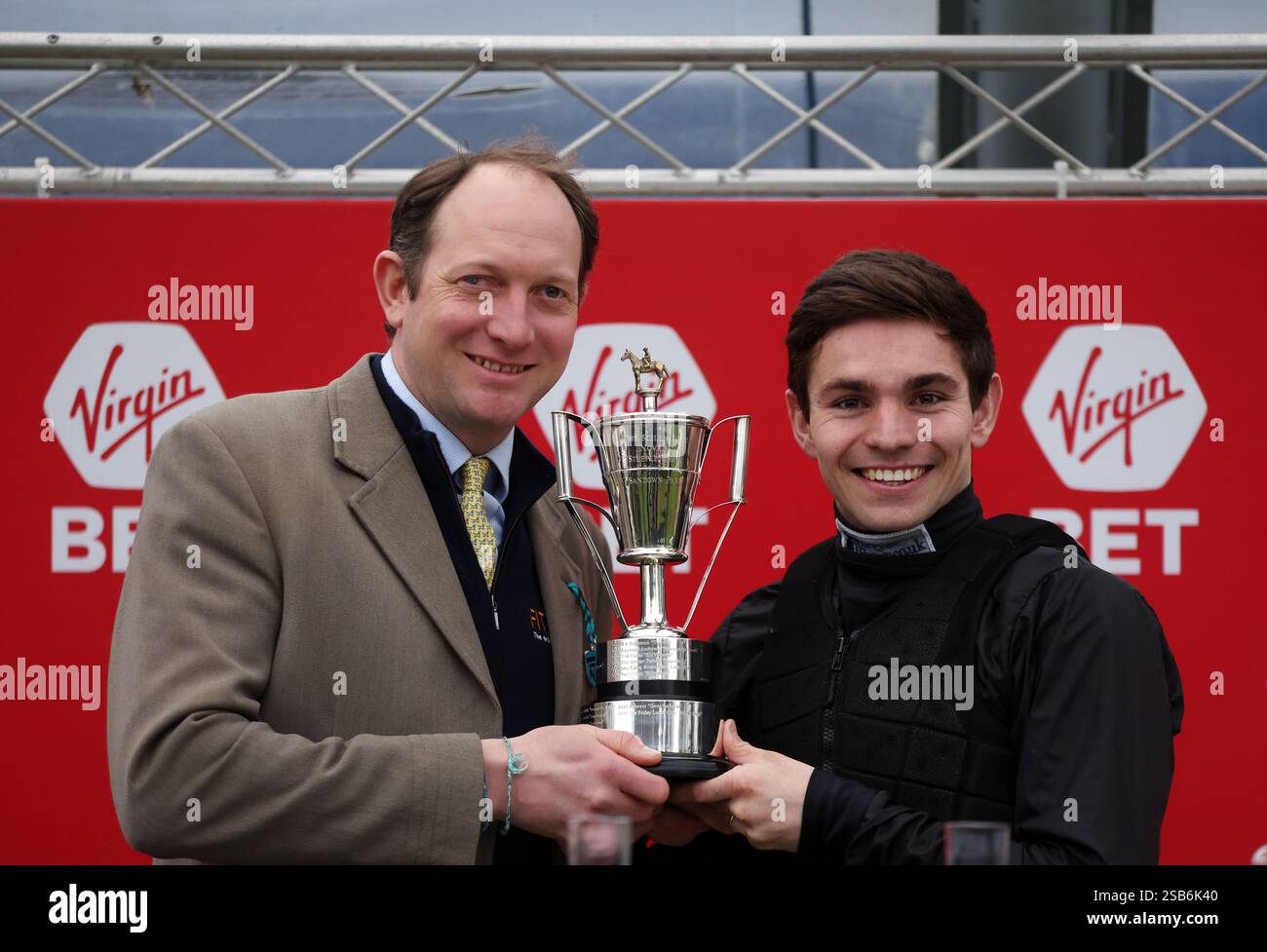 Trainer Ben Pauling (left) and jockey Ben Jones after winning the ...