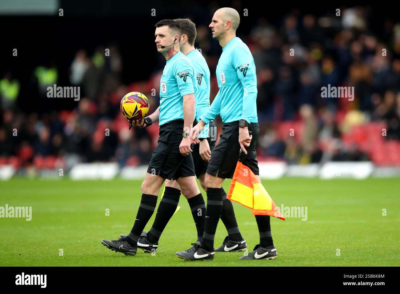 Referee Lewis Smith (left) during the Sky Bet Championship match at ...