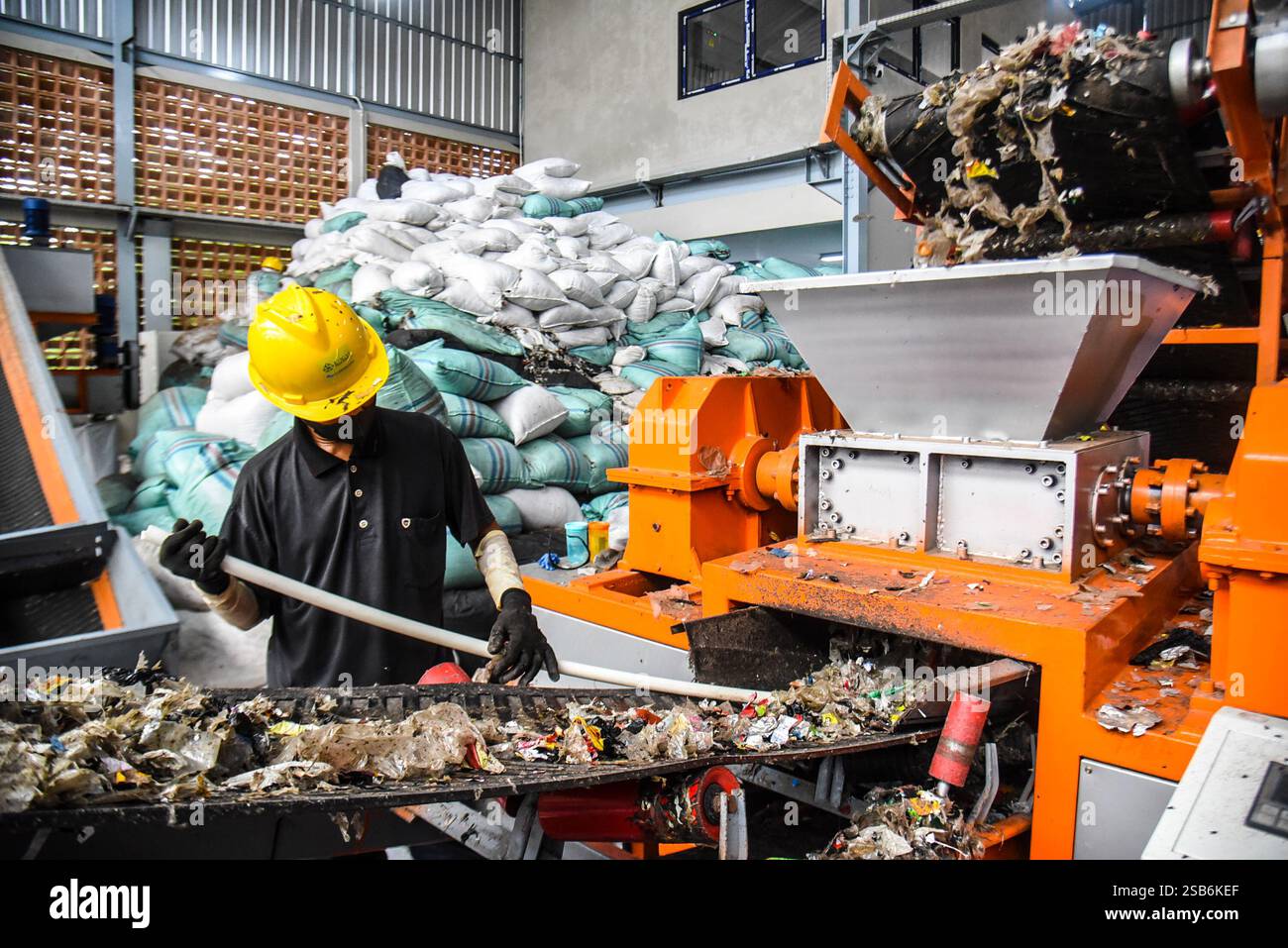 Bandung, West Java, Indonesia. 1st Feb, 2025. A worker process waste at ...