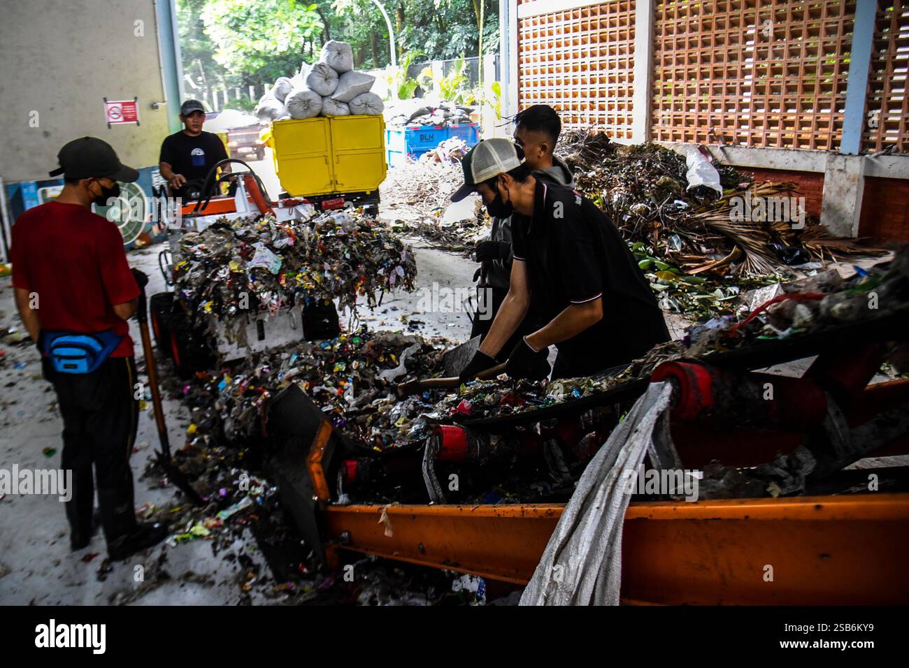 Bandung, West Java, Indonesia. 1st Feb, 2025. Workers process waste at ...