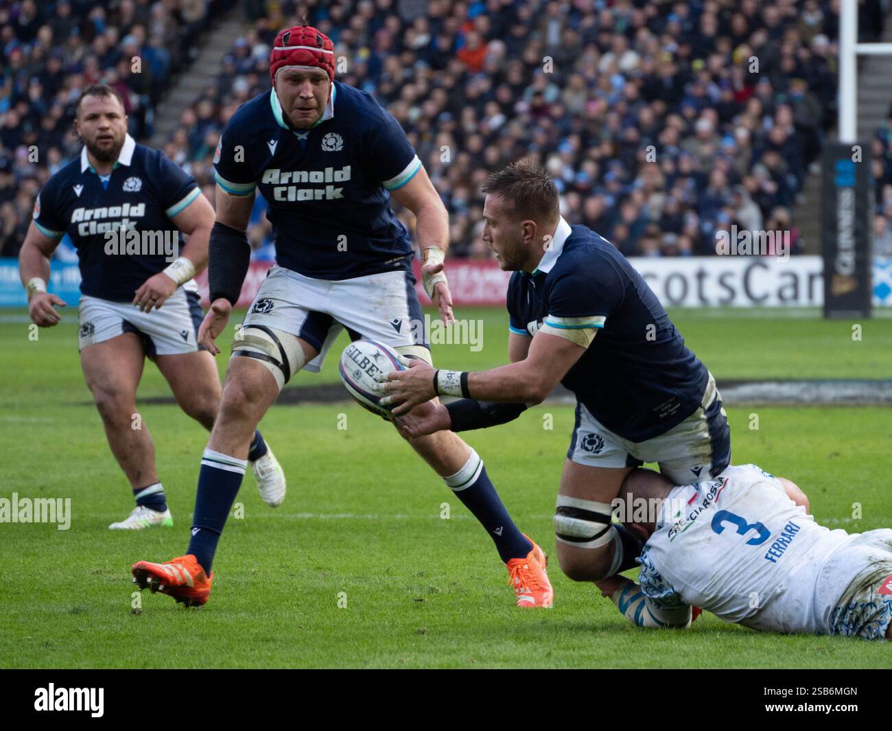8. Matt Fagerson is tackled in the Scotland vs Italy 6 Nations Rugby ...