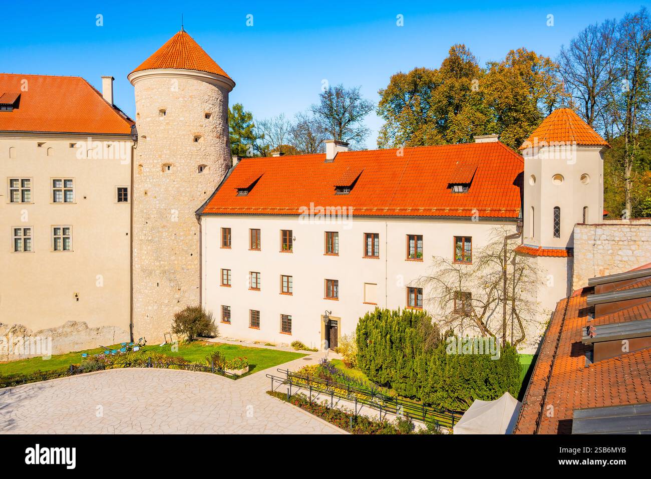 View of Pieskowa Skala castle in park with autumn fall colors of trees ...
