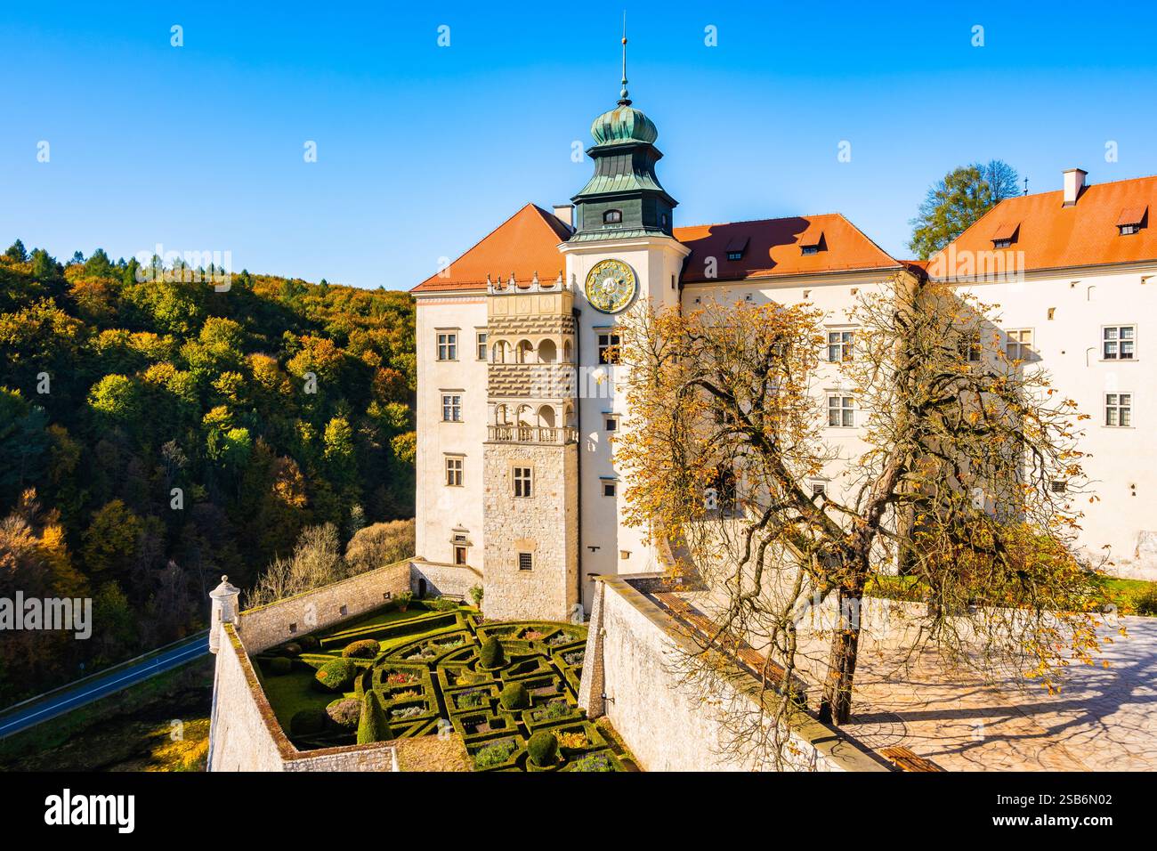 View of Pieskowa Skala castle in park with autumn fall colors of trees ...