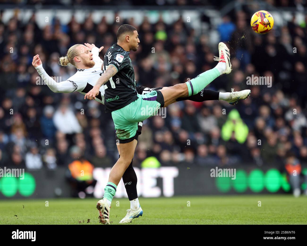 Derby County's Lars-Jorgen Salvesen and Sheffield United's Vinicius ...
