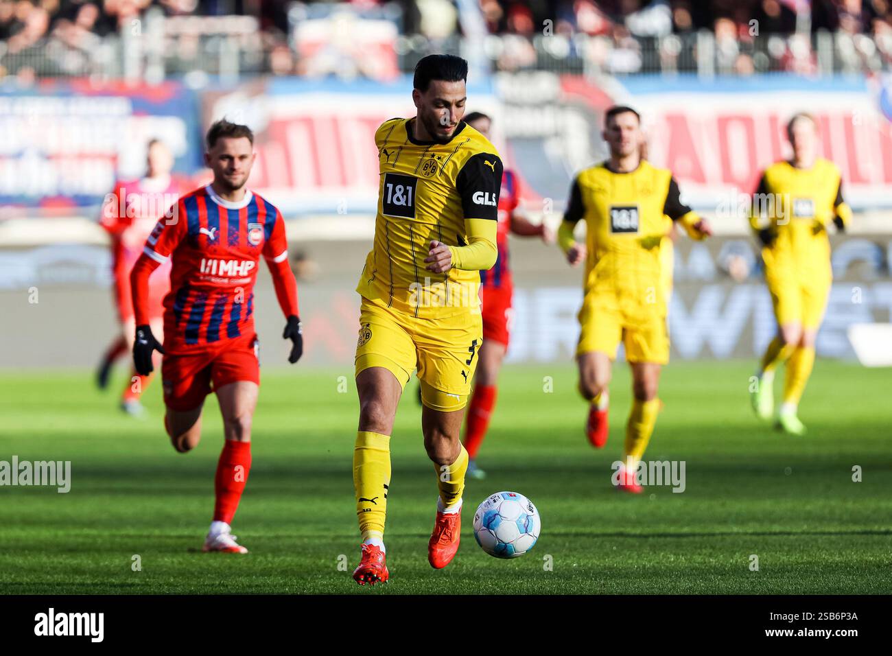 Heidenheim, Deutschland. 01st Feb, 2025. Ramy Bensebaini (Borussia Dortmund, #05) GER, 1.FC ...