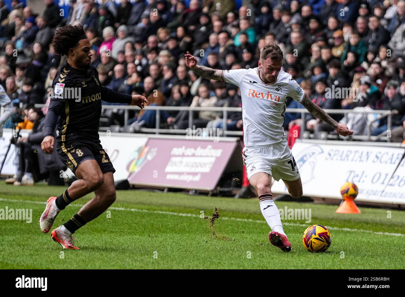 Josh Tymon of Swansea City crosses the ball during the Sky Bet ...