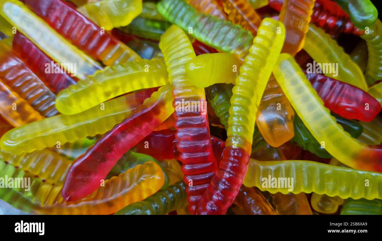 Colourful worm sweets hi-res stock photography and images - Alamy