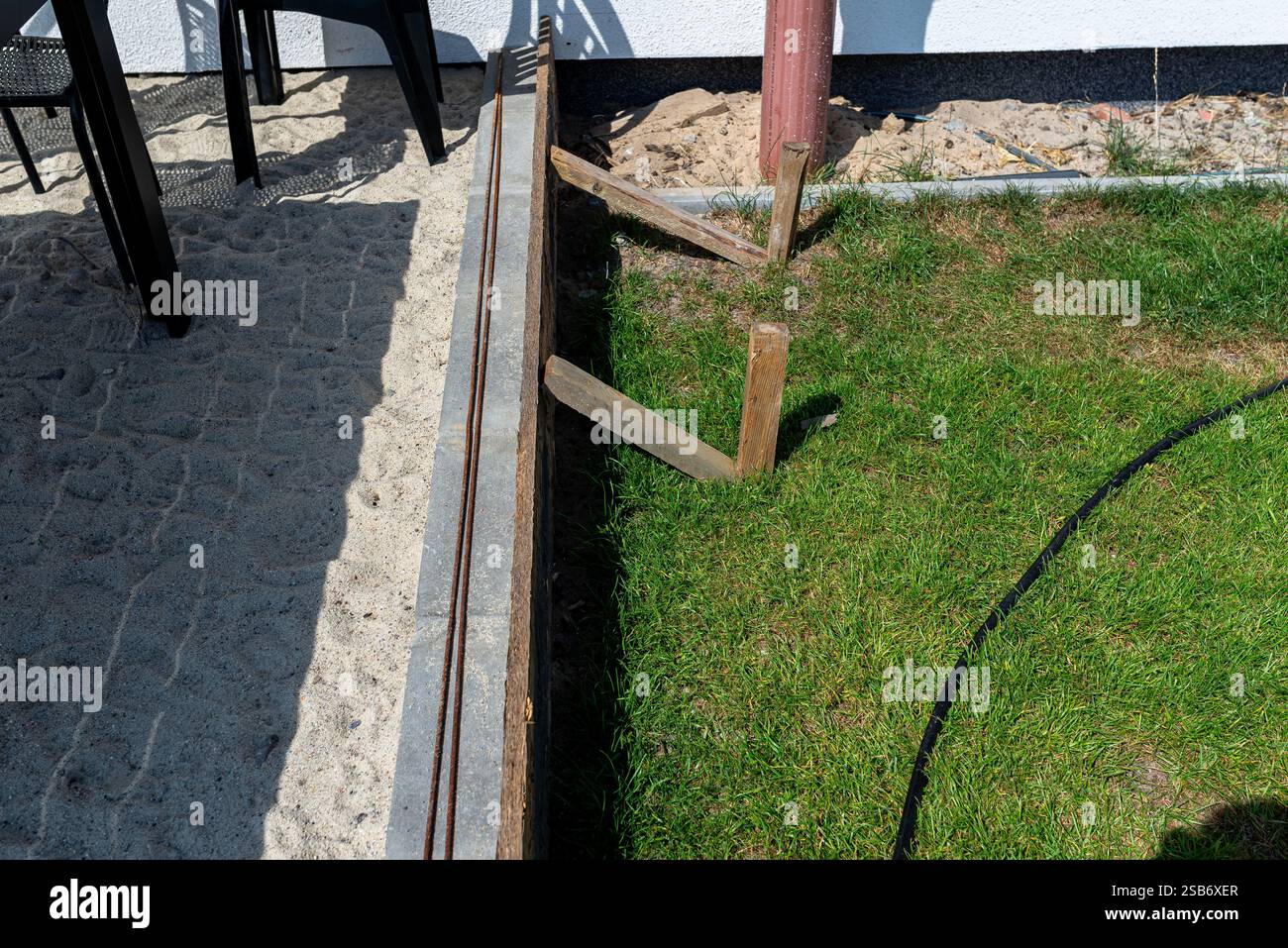 Reinforcing bars lying on concrete bricks, preparation for pouring ...