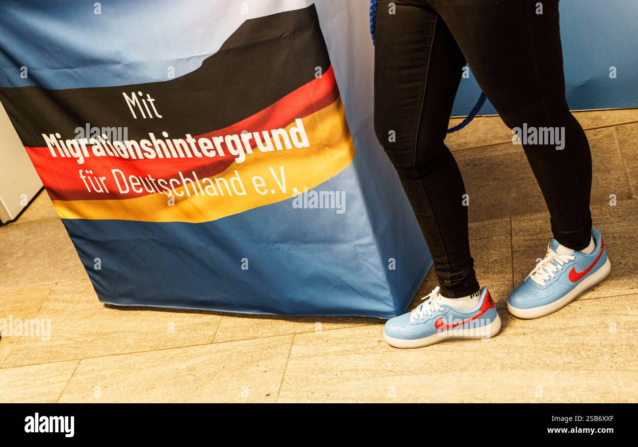 Neu Isenburg, Germany. 01st Feb, 2025. A woman with shoes in AFD design ...