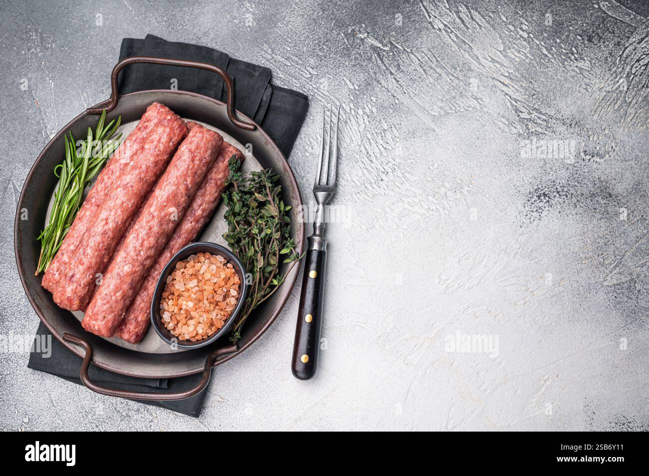 Raw Cevapcici ready for the grill, fresh Cevapi from mince beef meat ...