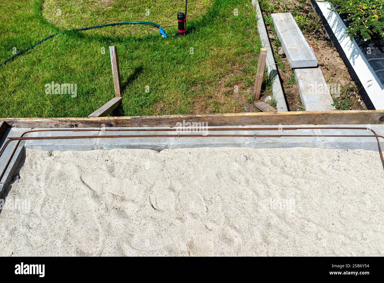 Reinforcing bars lying on concrete bricks, preparation for pouring ...