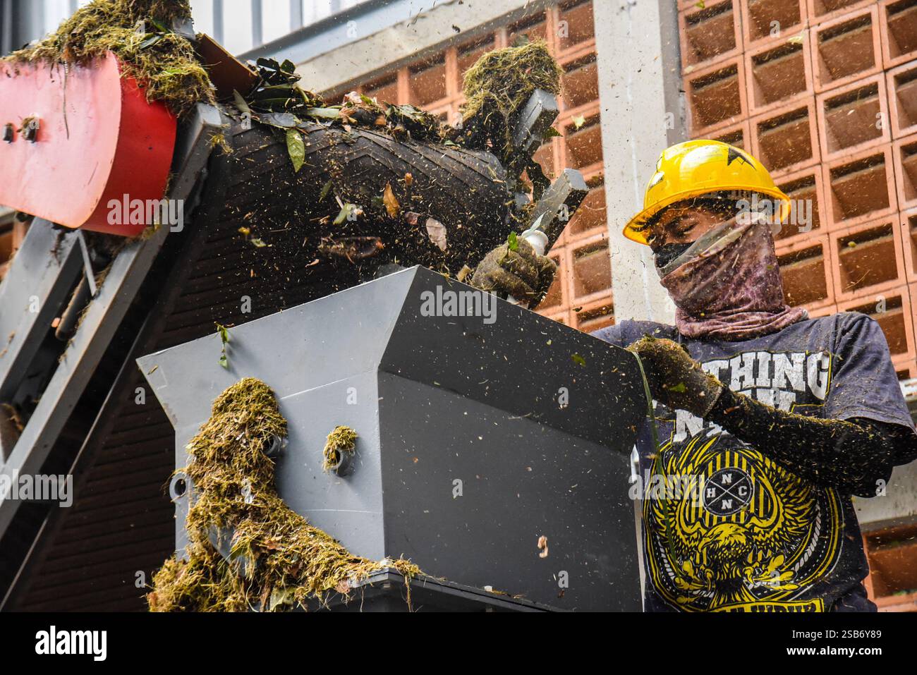 February 1, 2025, Bandung, West Java, Indonesia: A worker process waste ...