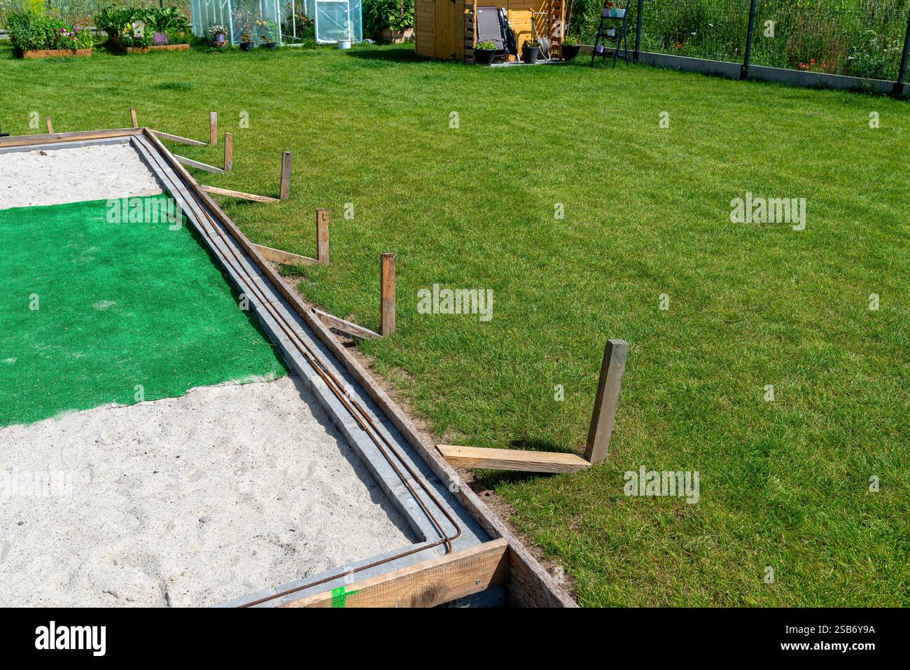 Reinforcing bars lying on concrete bricks, preparation for pouring ...