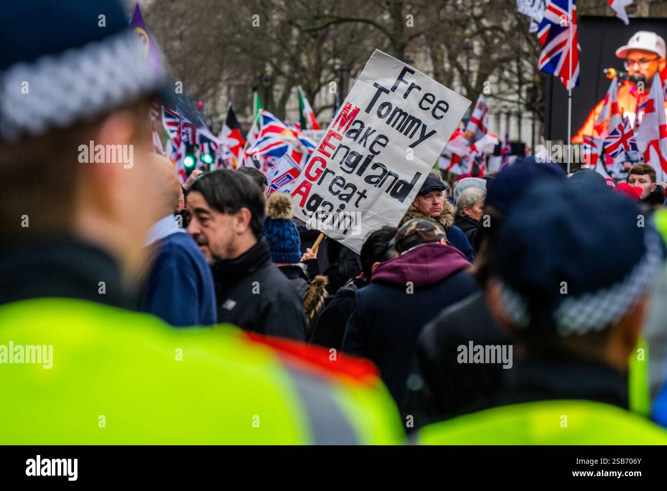 London, UK. 1st Feb, 2025. The police keep a buffer zone as they are ...