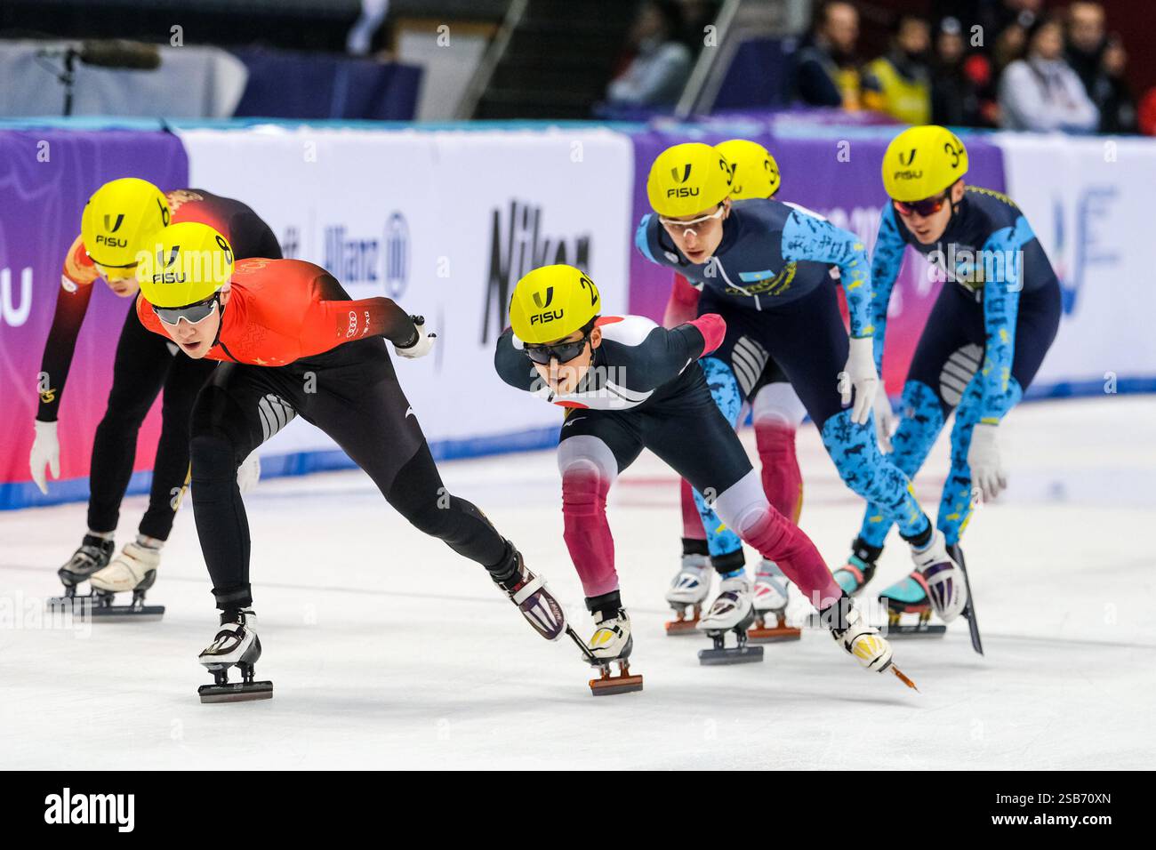 Tiany Zhang (CHN), Daito Ochi (JPN) and Valeiry Klimenko (KAZ) compete ...