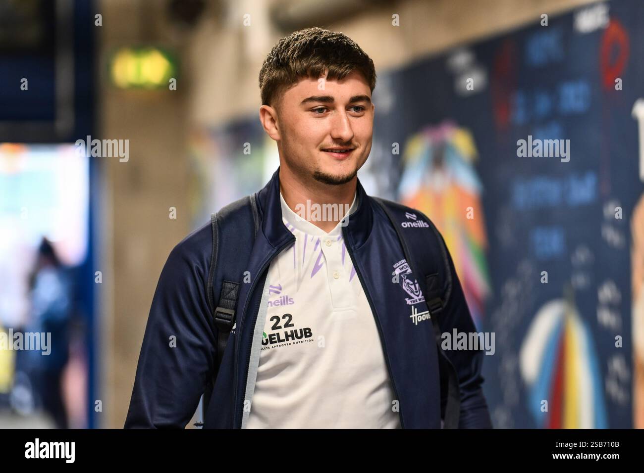 Tom Whitehead of Warrington Wolves arrives ahead of Toby King's ...